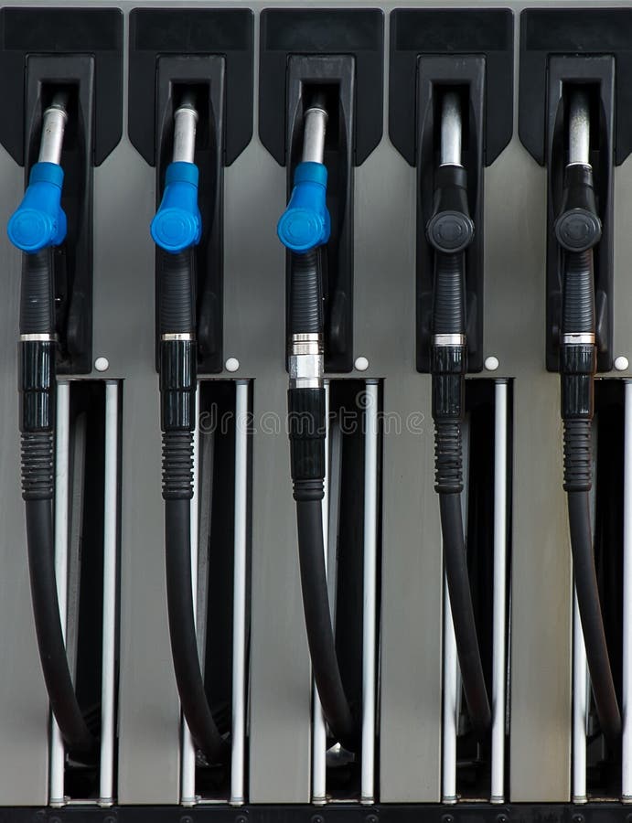 Five refueling nozzles. stock image. Image of economy - 84768195