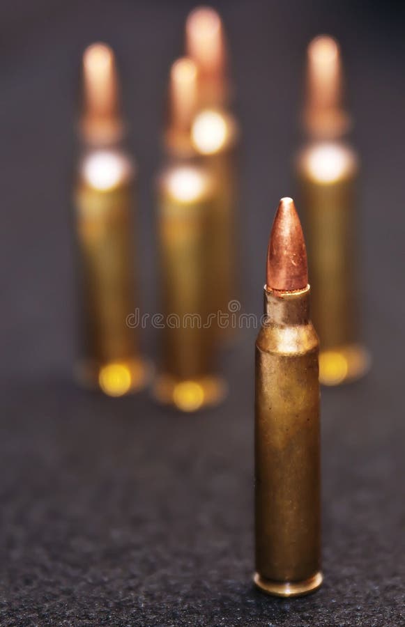 Five brass hunting bullets stock photo. Image of cartridge - 155318498