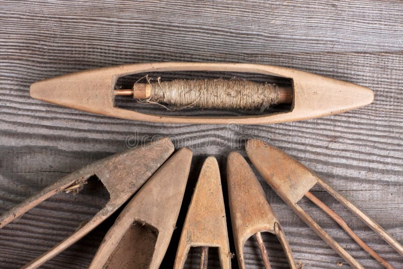 Five Shuttles on a Wooden Table 2 Stock Photo - Image of rope, fiber ...