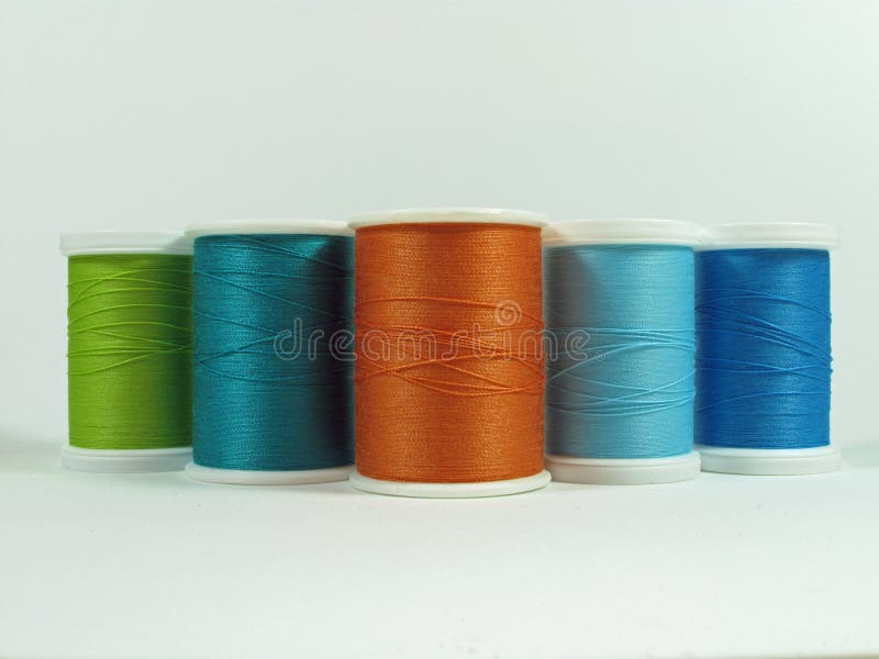 Five Spools of Cotton Thread Stock Photo - Image of abstract, clothing ...
