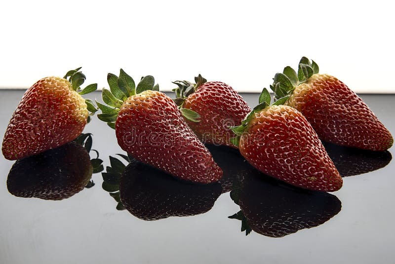 Five Strawberries in the Process of Decomposition Stock Image - Image ...