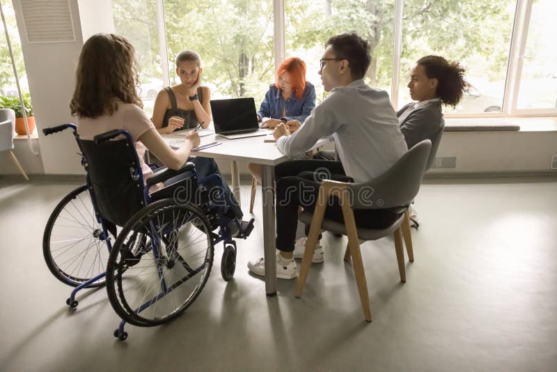Five Students and Girl with Disability Studying in Classroom Stock ...
