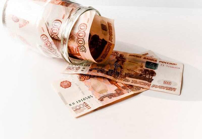 Five Thousandth Notes are Packed in a Glass Jar. Russian Banknotes with ...