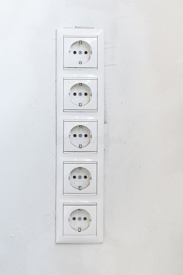 Electrical Sockets on White Wall. Empty, Unplugged European Wall Outlet ...