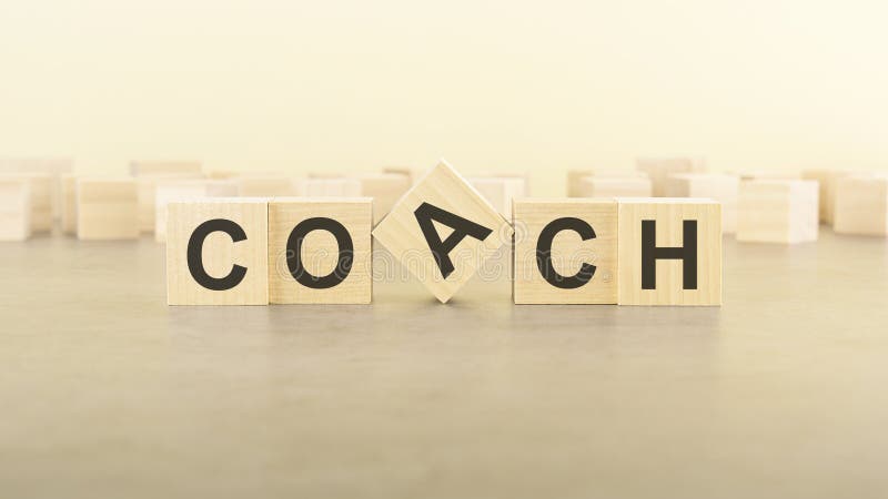 Five Wooden Blocks with the Letters COACH on the Surface Table Stock ...