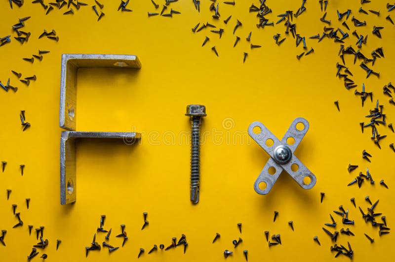 Fix Word Made of Construction Fasteners Stock Image - Image of ...