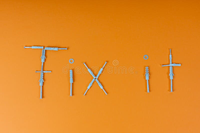 Fix it Written with Screws and Dowels Stock Photo - Image of fastener ...