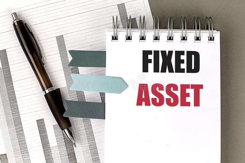 Fixed Asset Text on Notebook with Pen, Bar Charts, and Sticky Notes on ...