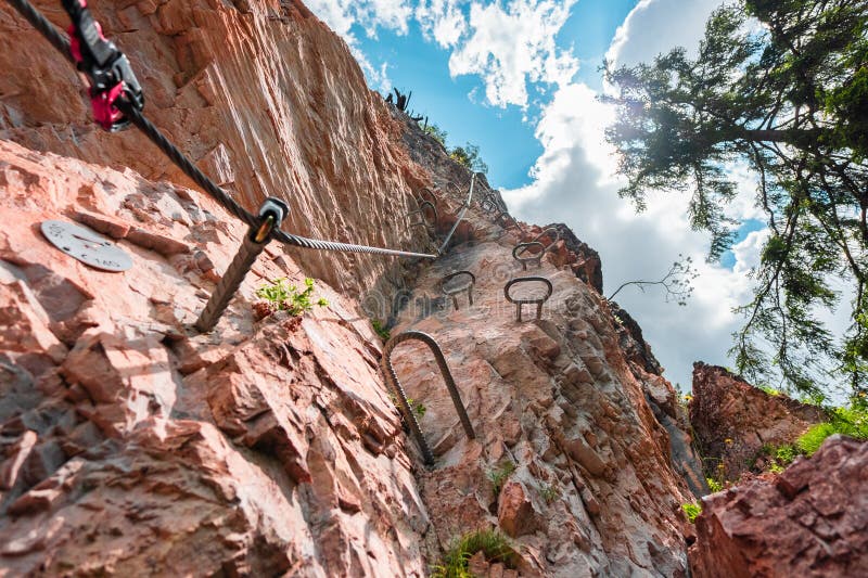 Fixed Steel Wire and Steps Going Up a Via Ferrata Climbing Path on a ...