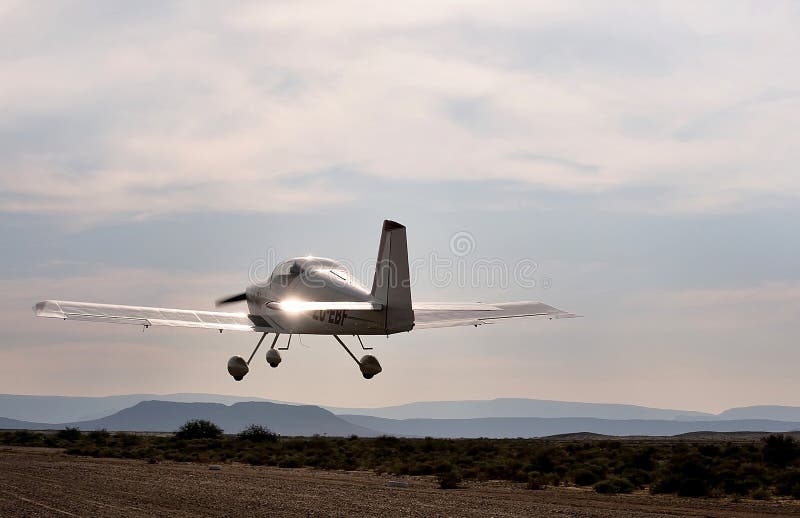 A Fixed Wing Plane Doing an Early Morning Take-off Editorial Stock ...