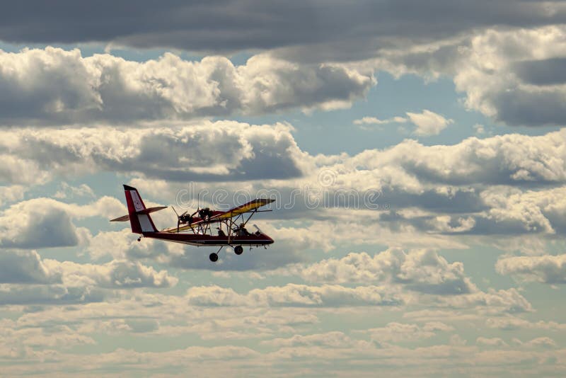 A Fixed Wing Twin Engine Open Cabin Propeller Airplane Equiped with ...