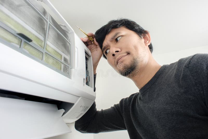 Fixing air condition stock image. Image of conditioning - 167269239