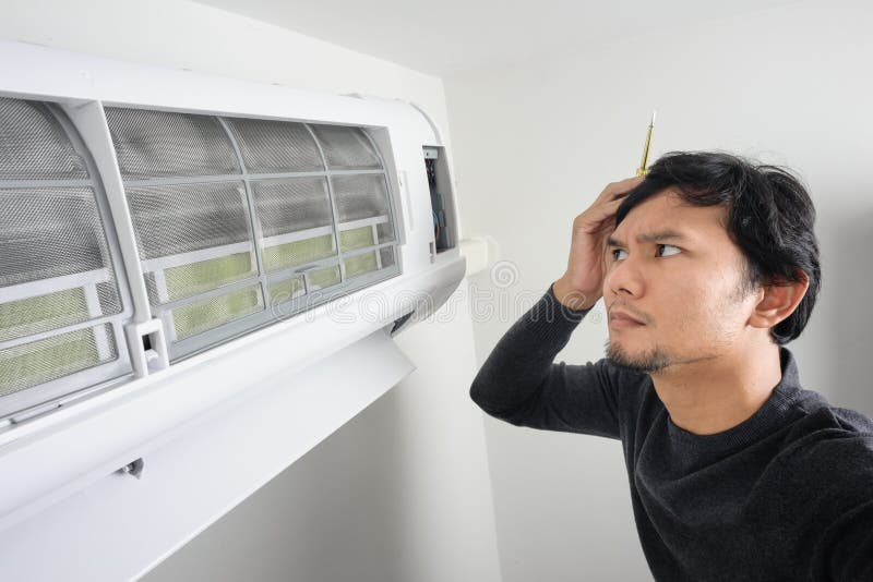 Fixing air condition stock photo. Image of closeup, boring - 167269416