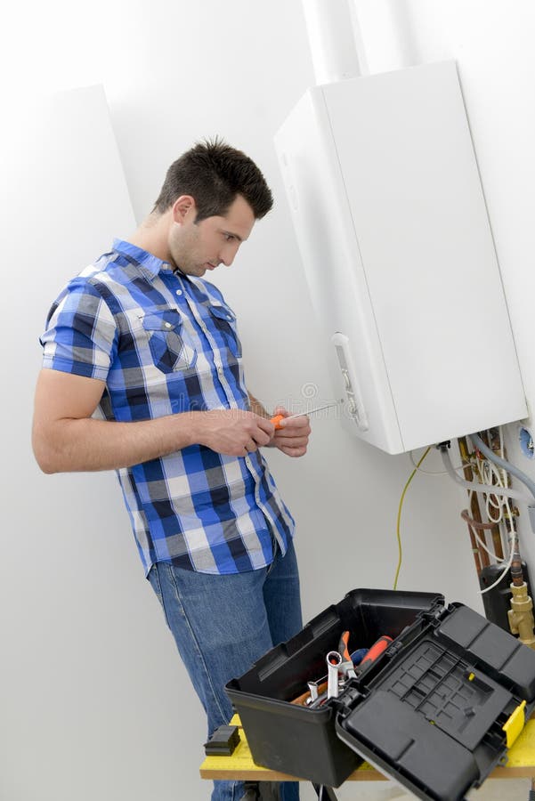 Fixing the boiler system stock image. Image of mend - 122050891