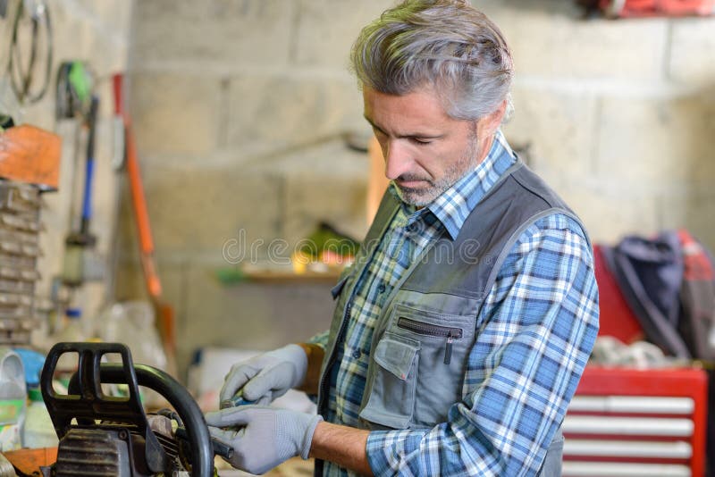 Fixing a broken equipment stock photo. Image of safety - 122048096