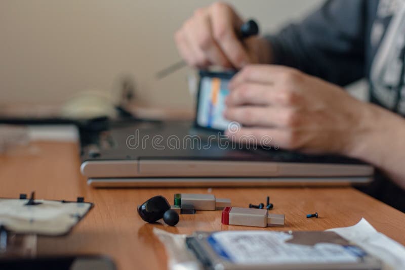 Fixing broken laptop stock photo. Image of assembling - 194102914