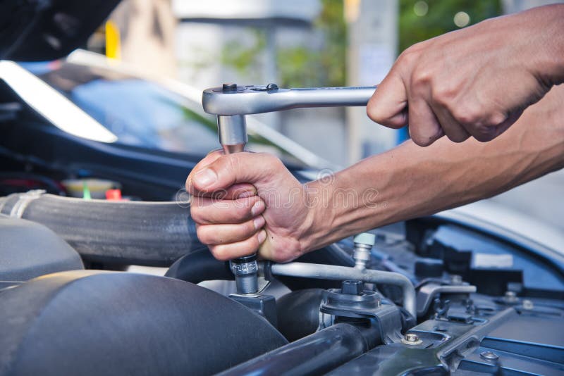 Fixing a car stock photo. Image of black, garage, people - 77561086