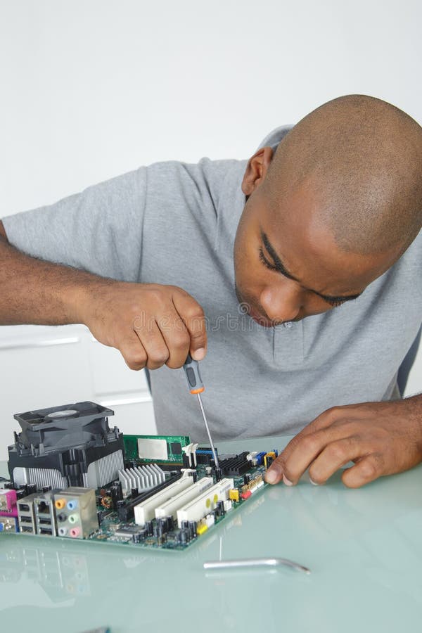 Fixing a circuit unit stock image. Image of profession - 132200261