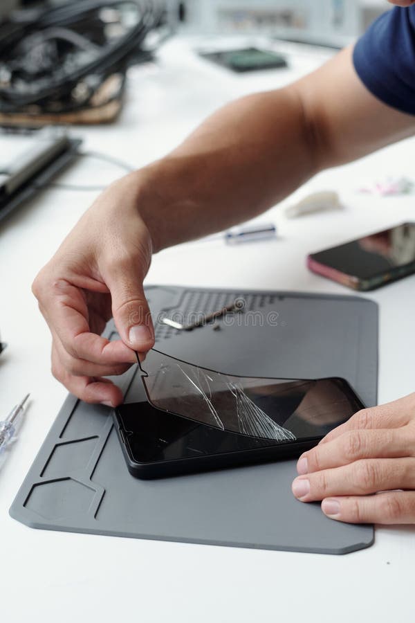 Fixing Cracked Smartphone Screen with Precision Tooling Stock Photo ...