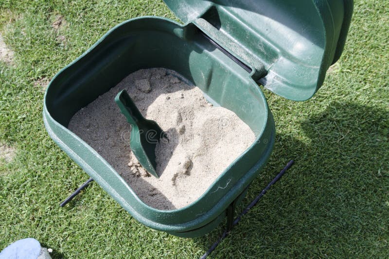 Fixing Divots on the Tee stock photo. Image of professional - 15104188