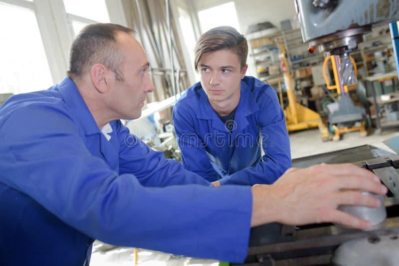 They Fixing Drilling Machine Stock Photo - Image of workshop, repairs ...