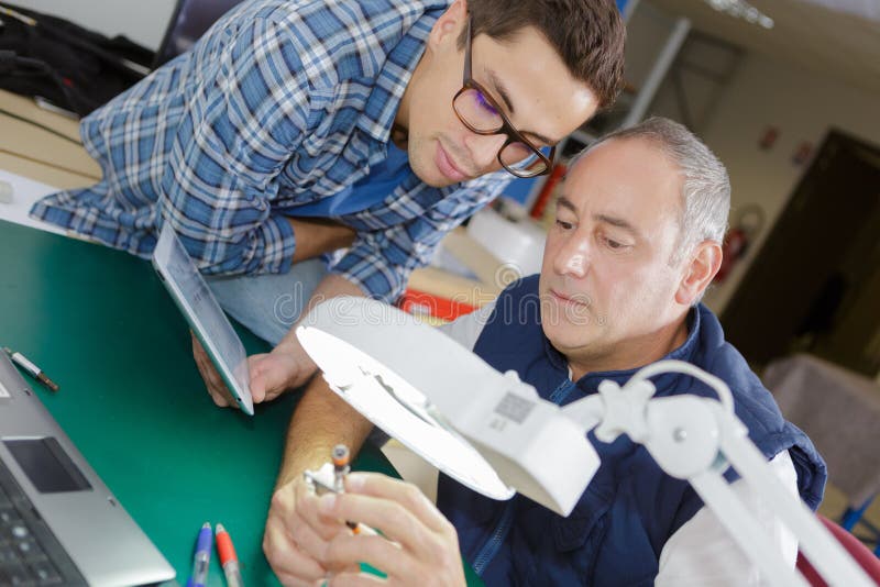 Fixing an Electronic Device Stock Image - Image of fixing, together ...