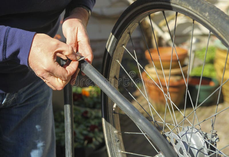 Fixing flat bike tire stock photo. Image of fixing, blue - 32102456