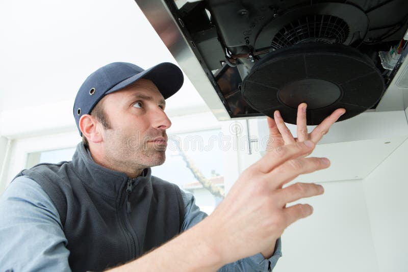 Fixing Kitchen Extraction Unit Stock Image - Image of house, install ...