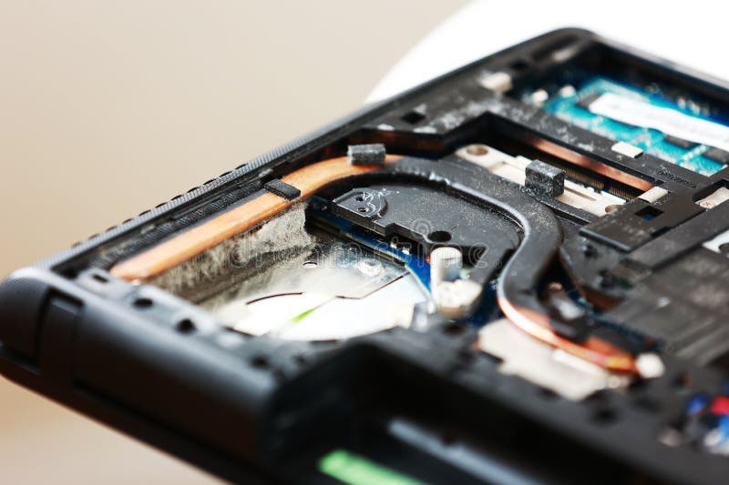 Fixing Laptop. Repairman Holds Cooling Fan and Repairs from Overheating ...