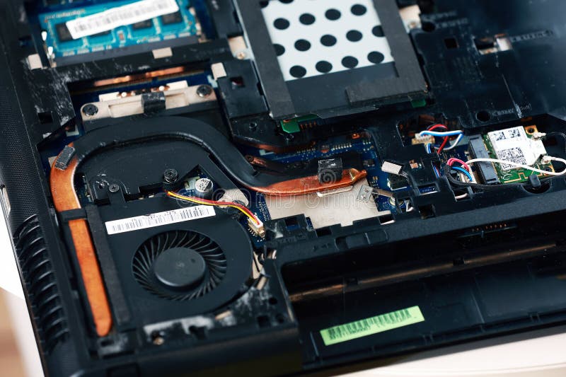 Fixing Laptop. Repairman Holds Cooling Fan and Repairs from Overheating ...