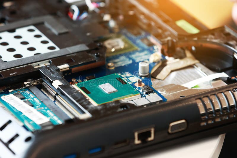 Fixing Laptop. Repairman Holds Cooling Fan and Repairs from Overheating ...