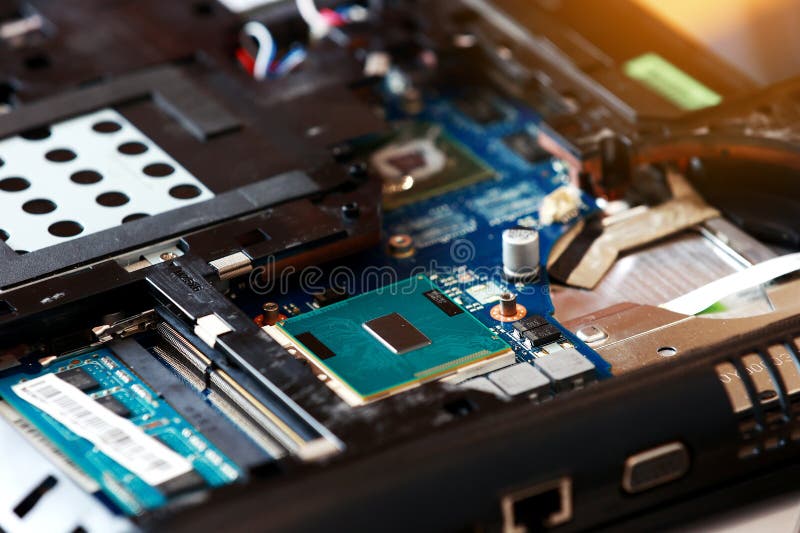 Fixing Laptop. Repairman Holds Cooling Fan and Repairs from Overheating ...