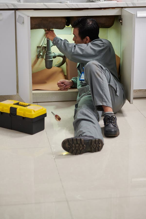 Fixing Leaking Kitchen Sink Stock Photo - Image of working, repair ...