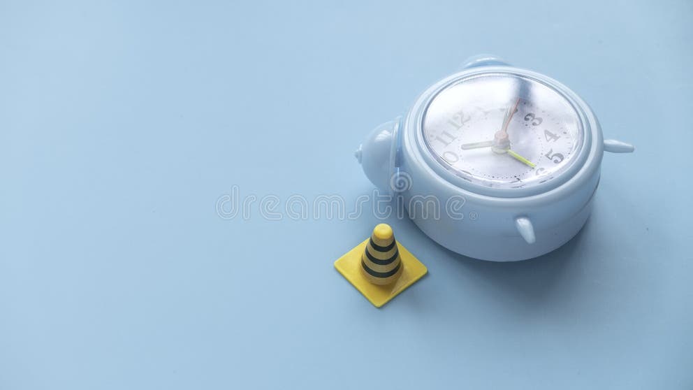 Fixing, Maintenance and Under Construction Concept. Alarm Clock with ...