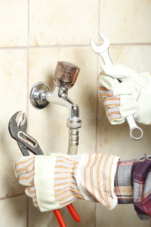 Repair Man is Fixing a Pipe Stock Photo - Image of machine, worker ...