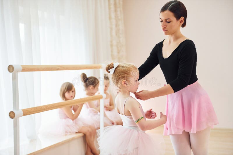 Fixing Posture. Little Ballerinas Preparing for Performance by ...