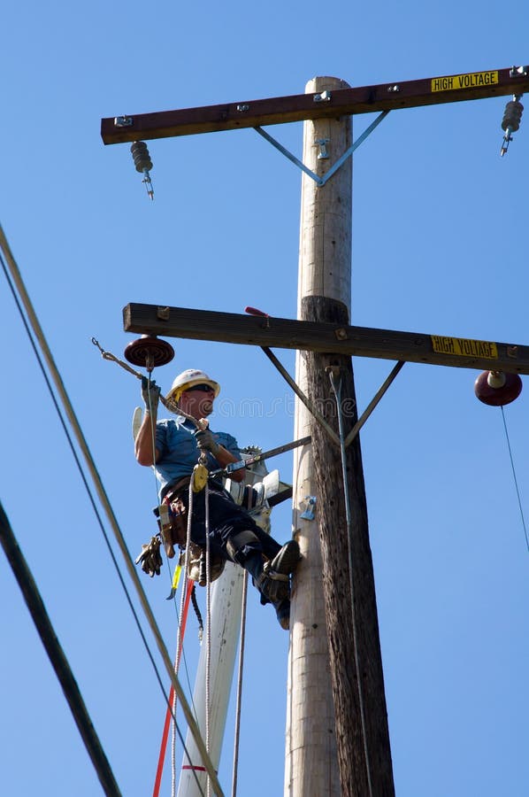 Power lineman stock photo. Image of helmet, team, harness - 136892