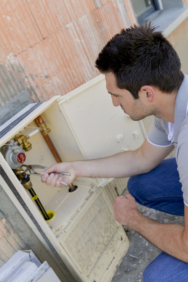Fixing the water line stock photo. Image of assistance - 120761556