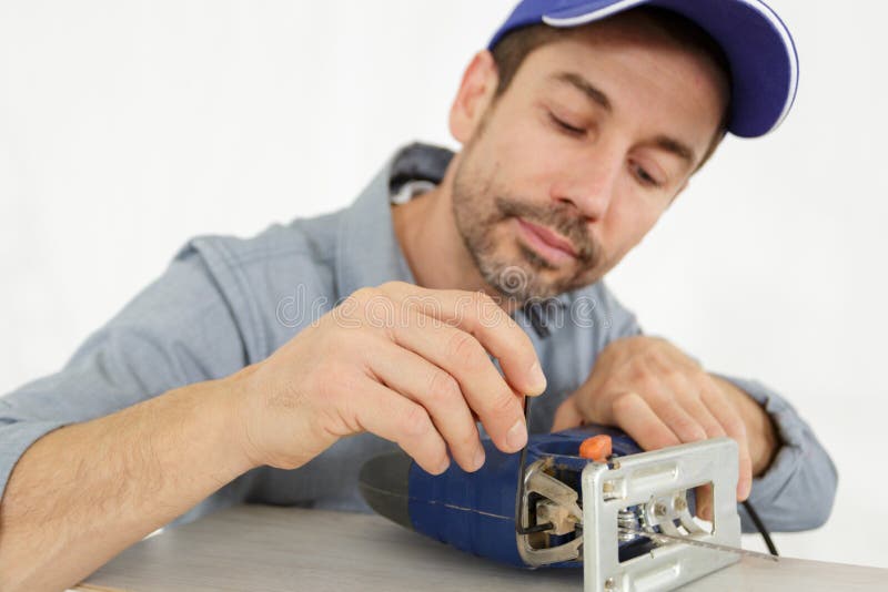 Fixing wood cutting tool stock photo. Image of installing - 261512736