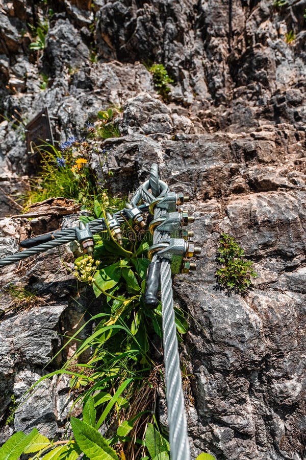 Fixture Mount of a Climbing Steel Wire Cable on a Natural Stone Rock ...