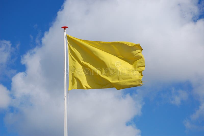 Yellow Caution Flag stock photo. Image of surf, seashore - 30439084