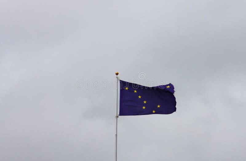 Flag of Alaska Flying Against Overcast Sky Stock Photo - Image of ...