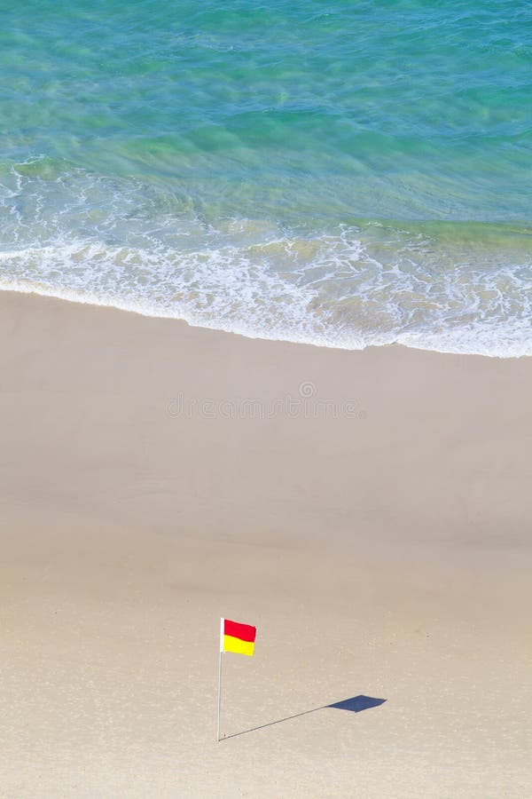 Safety Flag on a Beach stock photo. Image of coastline - 3233692