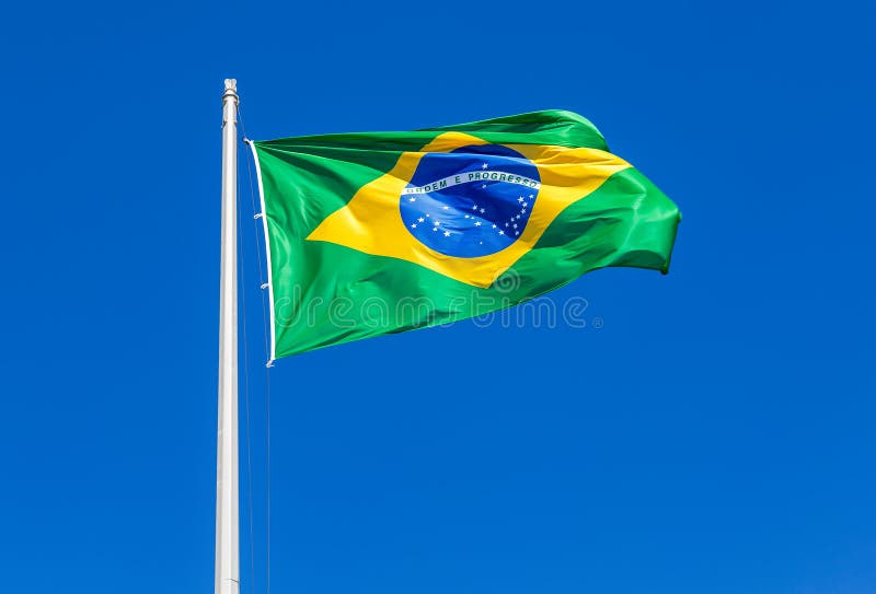 Flag of Brazil Waving in the Wind Against the Sky Stock Photo - Image ...