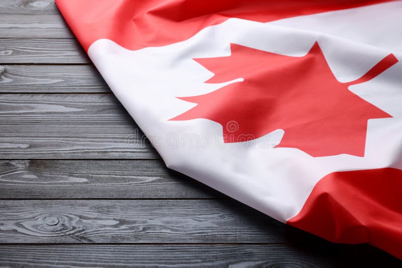 Flag of Canada on Dark Wooden Table, Closeup. Space for Text Stock ...