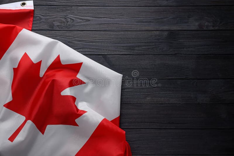 Flag of Canada on Dark Wooden Table, Top View. Space for Text Stock ...