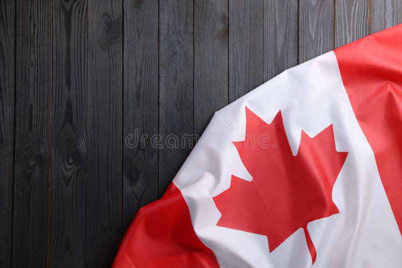 Flag of Canada on Dark Wooden Table, Top View. Space for Text Stock ...