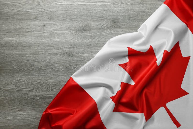 Flag of Canada on Wooden Table, Top View. Space for Text Stock Photo ...