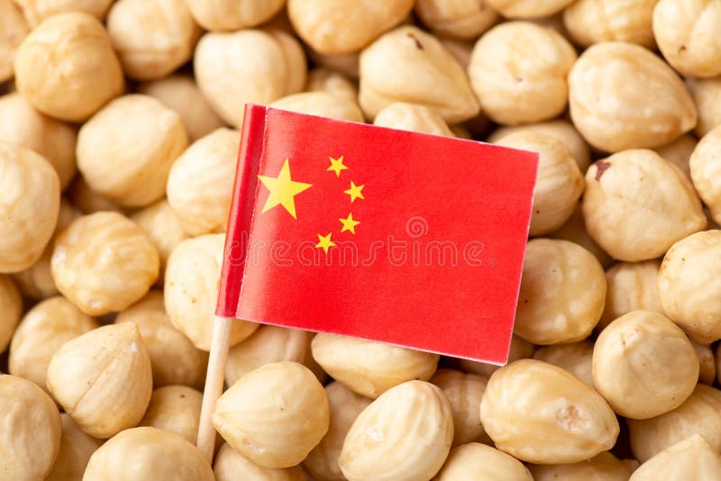 Flag of China on hazelnuts stock photo. Image of flag - 297405966