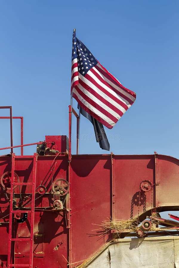 Flag on combine. stock photo. Image of white, americana - 58490996